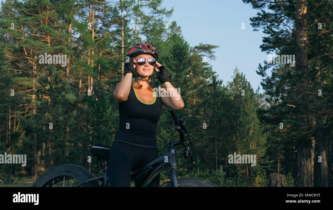 Fat bike also called fatbike or fat-tire bike in summer riding in the ...