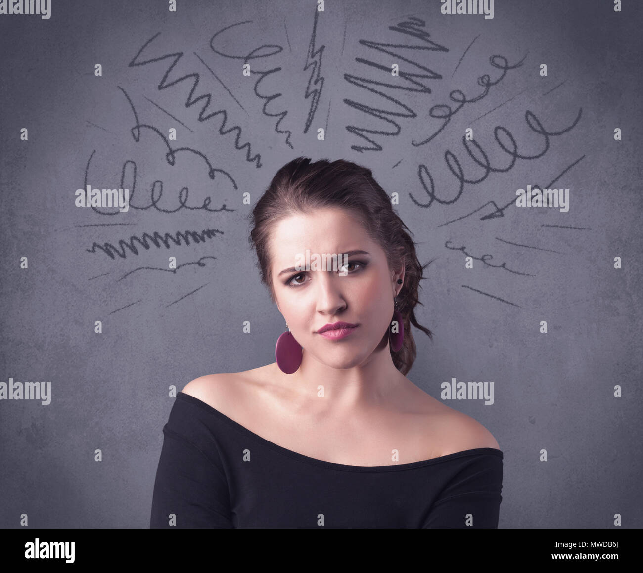 A cute female student making funny face expressions with pressure and ...