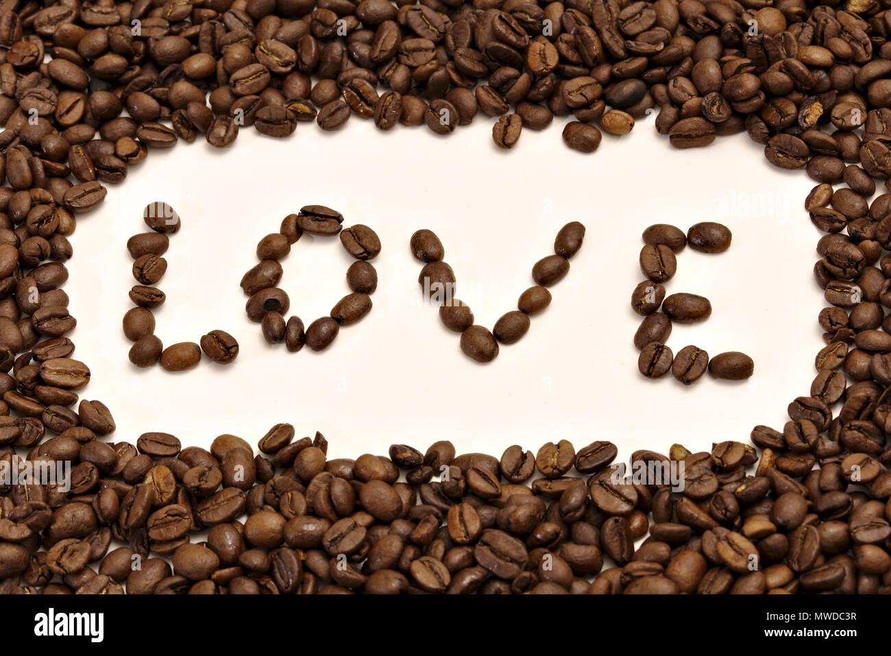 Roasted coffee beans forming hi-res stock photography and images - Alamy