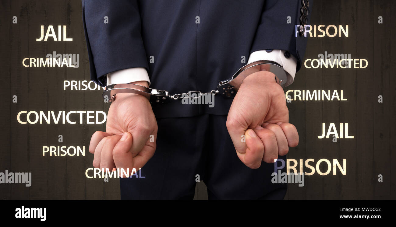 Jail convicted prison criminal labels with close handcuffed man Stock ...