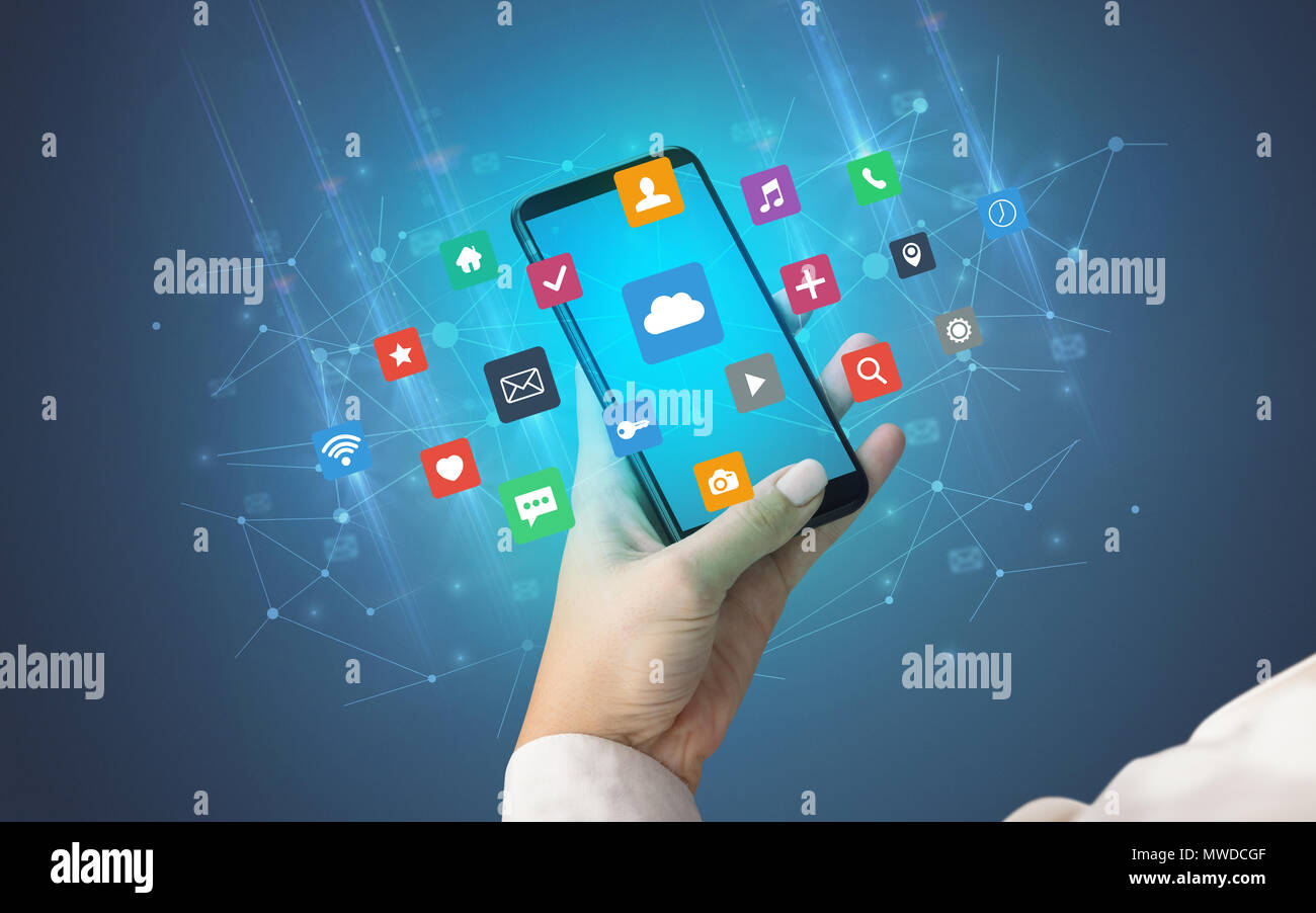 Female hand using smartphone with colorful application icons around ...