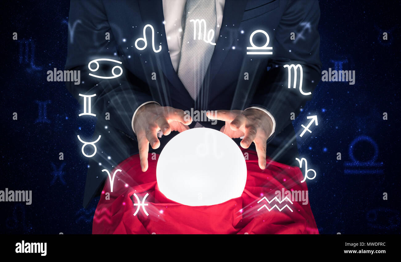 Young handsome astronaut looking for inspiration in his crystal magic ...