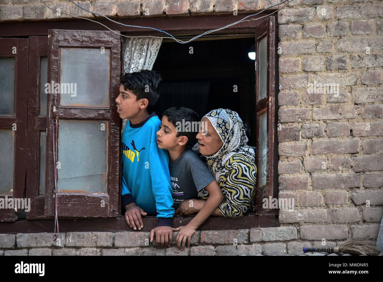 Throwing child out window hi-res stock photography and images - Alamy