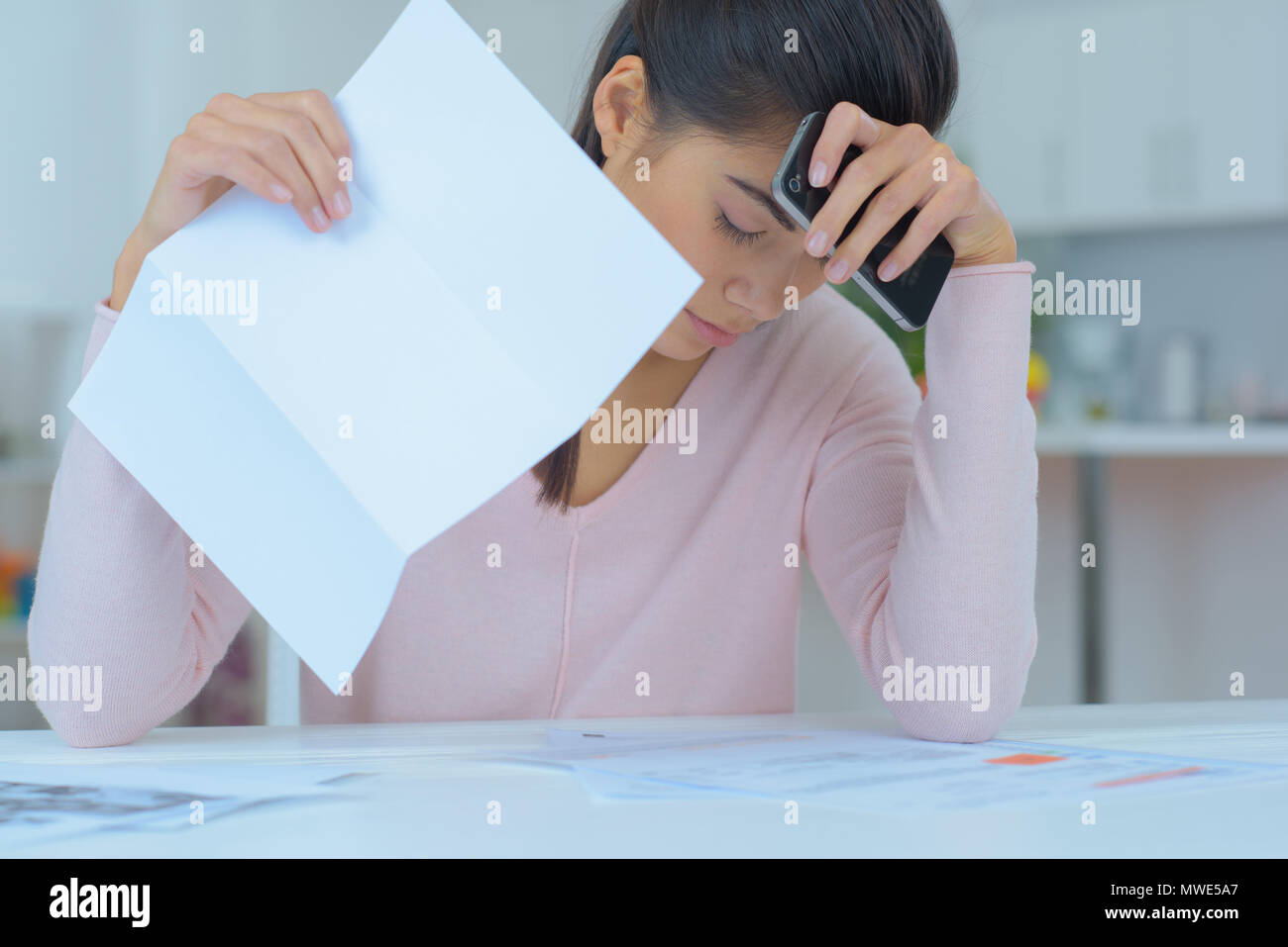 depressed woman accounting Stock Photo - Alamy