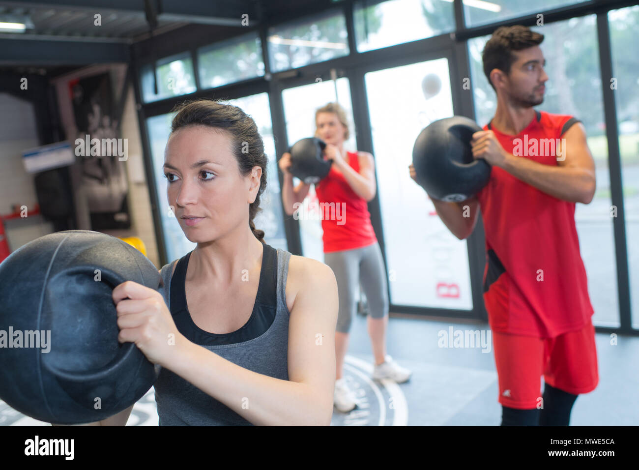 people training at a gym Stock Photo - Alamy