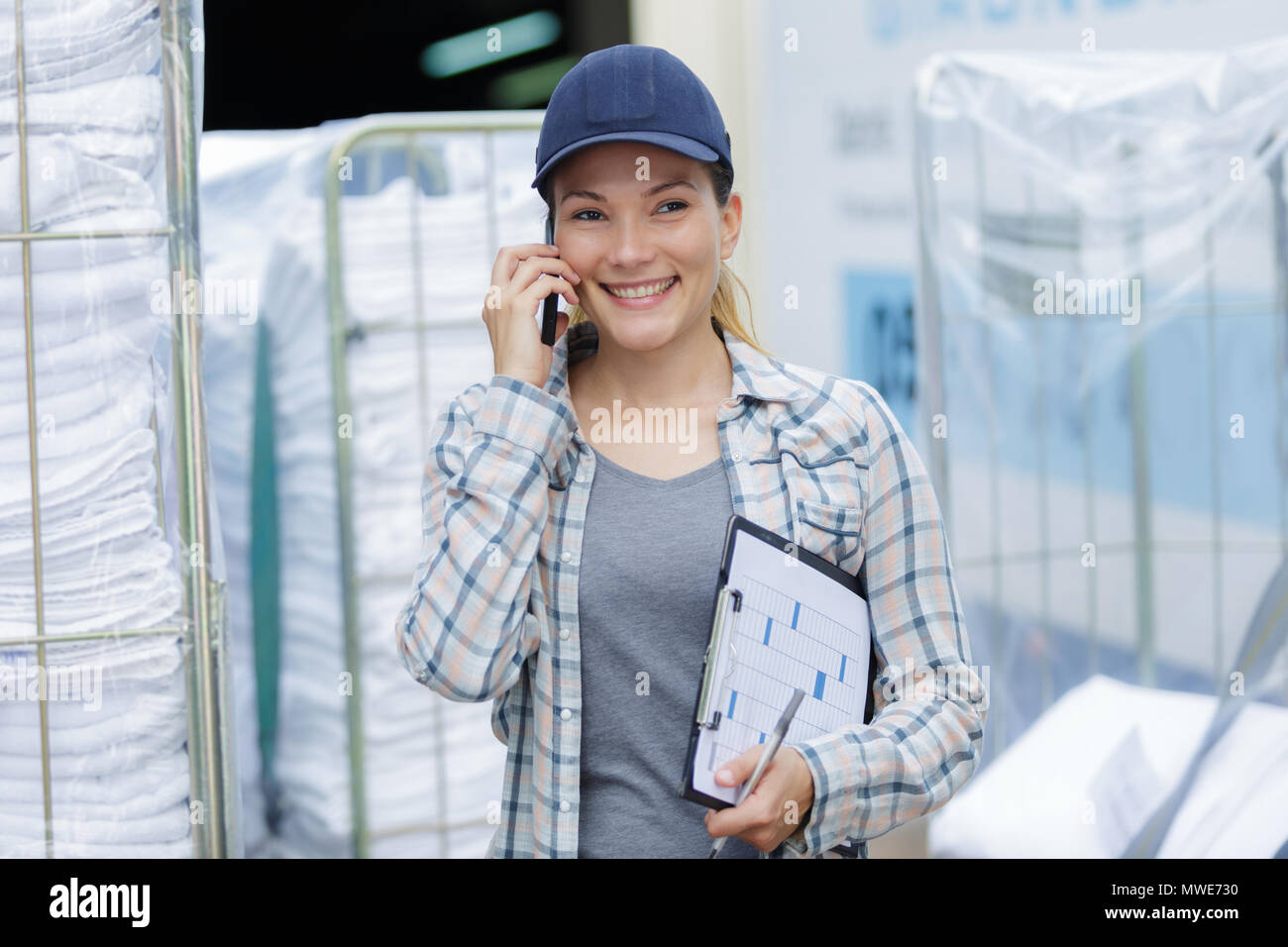 housekeeper manager and cleaning tool carts Stock Photo - Alamy