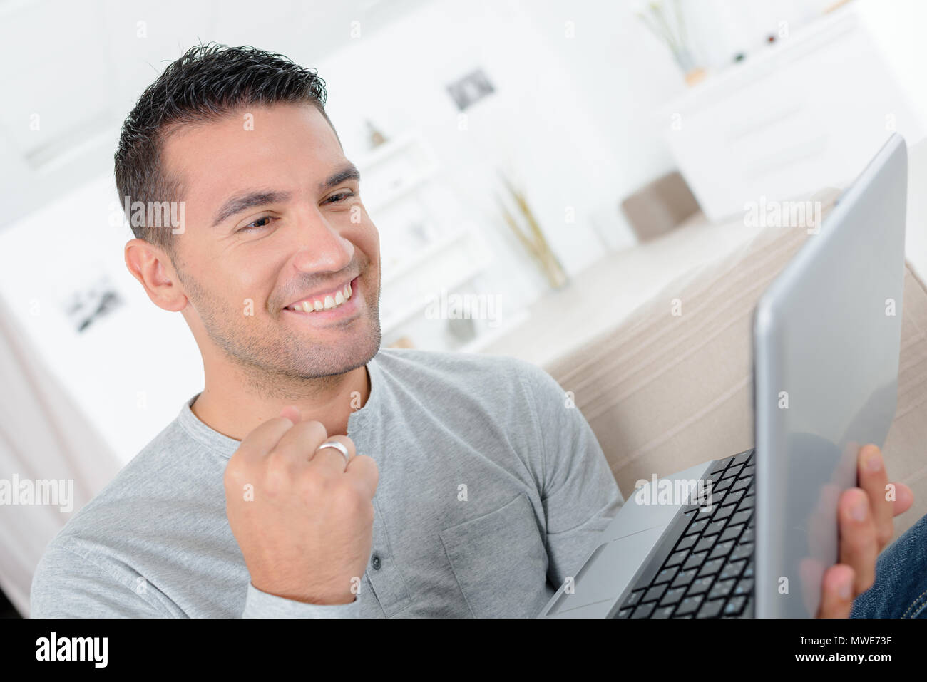 man happy with the online result Stock Photo - Alamy