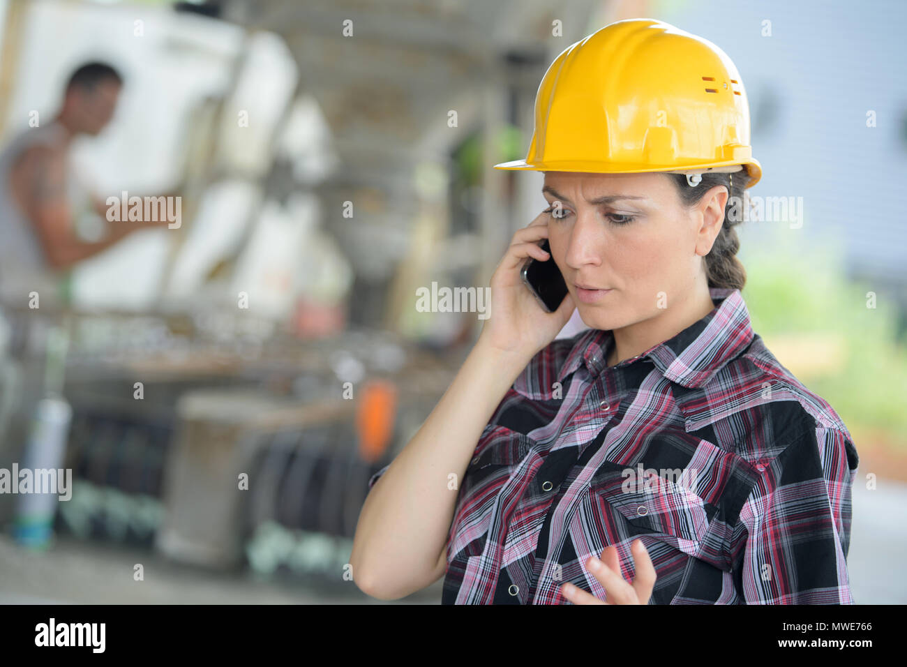 cement manager receiving a call Stock Photo - Alamy