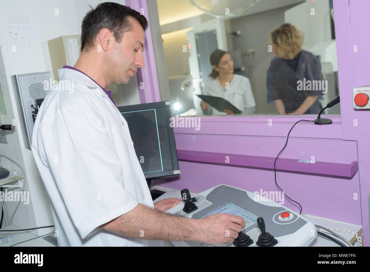 technician working at ct scan in modern hospital Stock Photo - Alamy