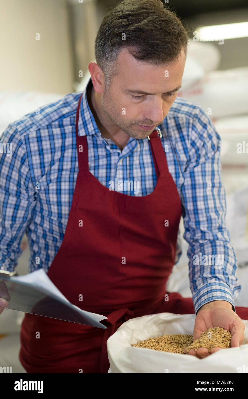 Examining seeds hi-res stock photography and images - Alamy