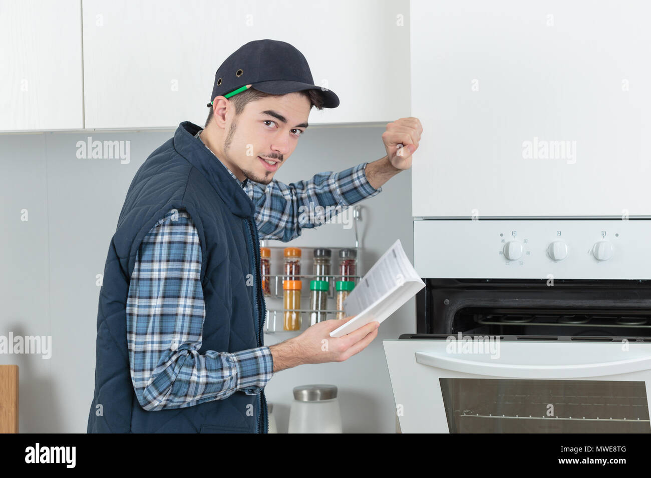 oven technician posing Stock Photo - Alamy