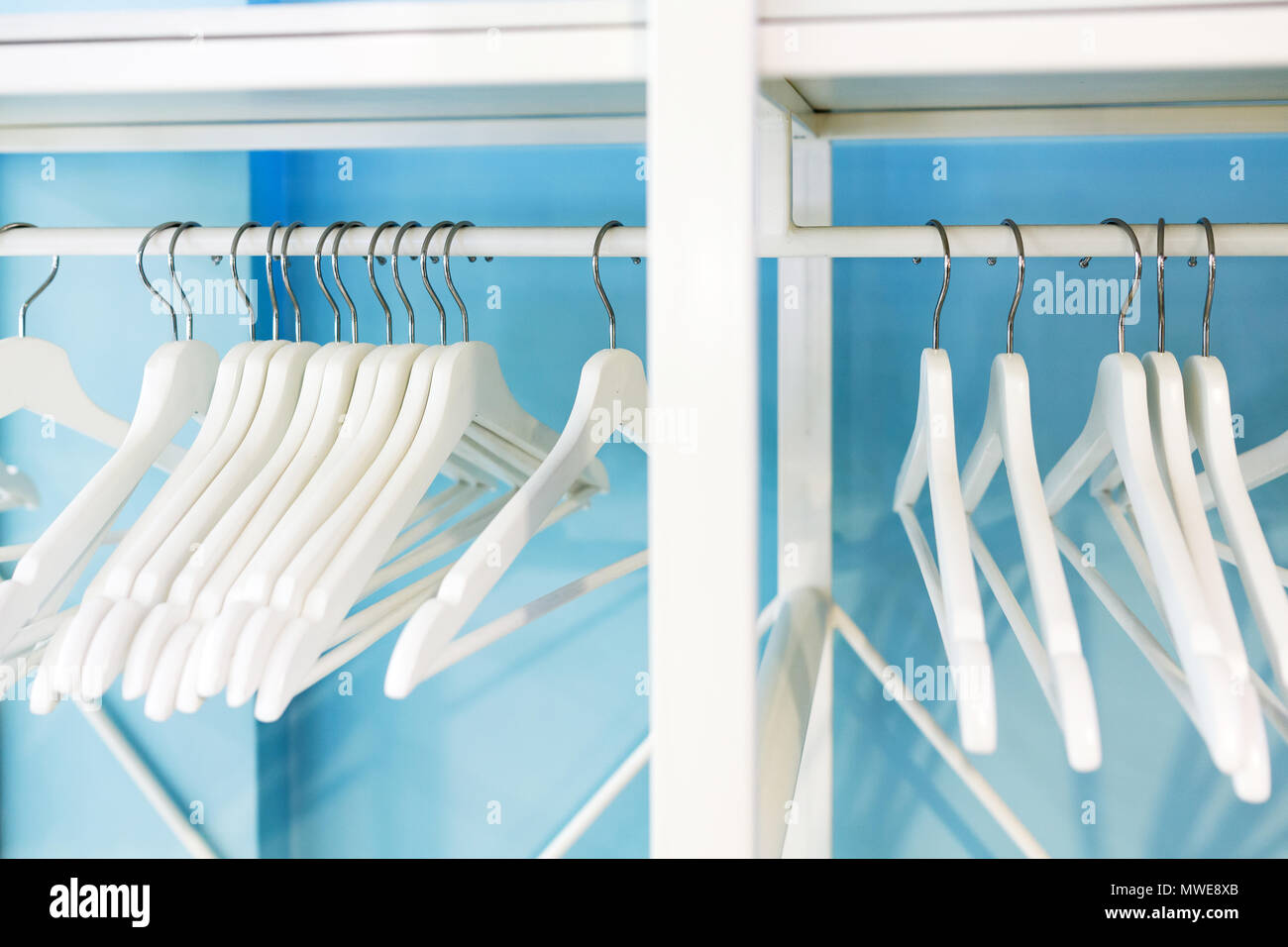 Coat hangers white wire hi-res stock photography and images - Alamy