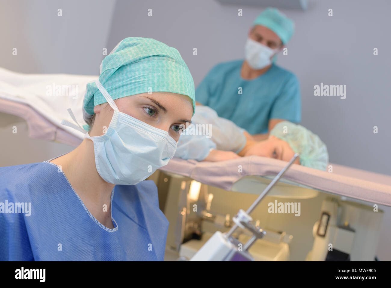 Female anesthesiologist in operating room hi-res stock photography and ...