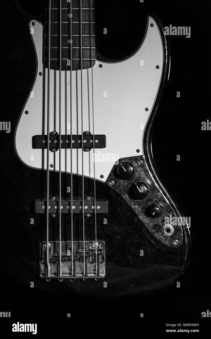 bass guitar, musical instrument on black background Stock Photo - Alamy