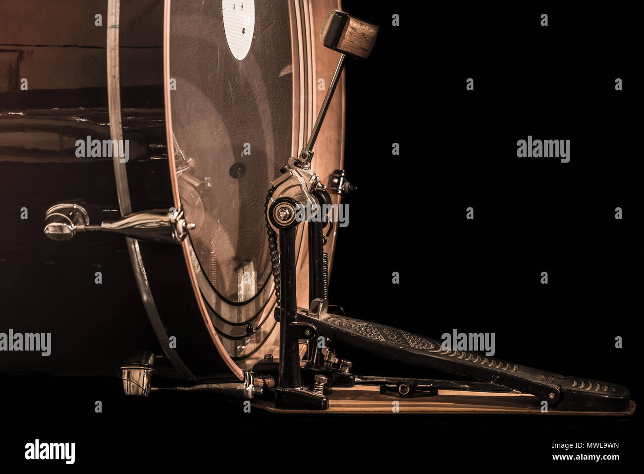 bass drum with pedal, musical instrument on black background Stock ...