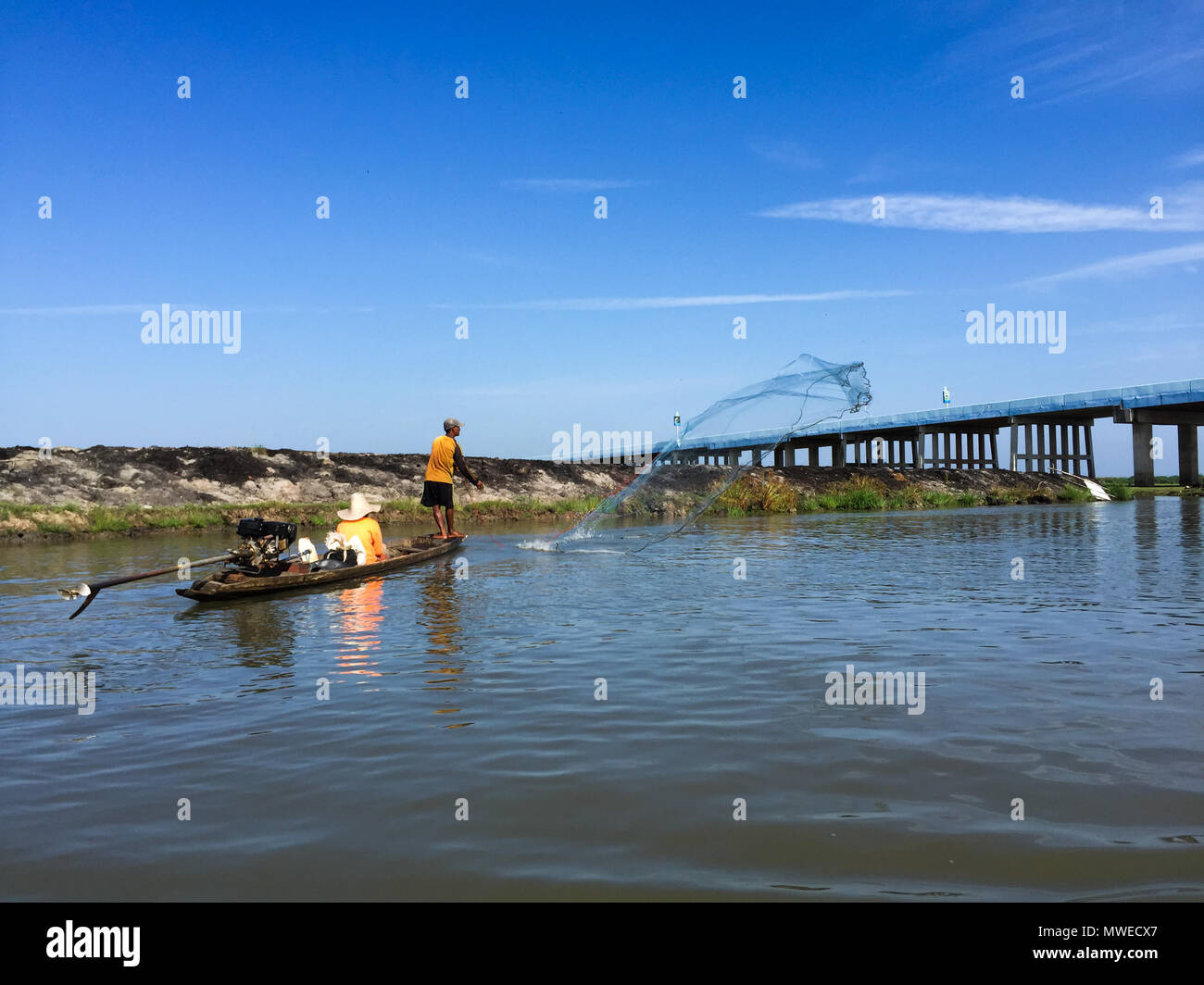 Catching with net hi-res stock photography and images - Alamy