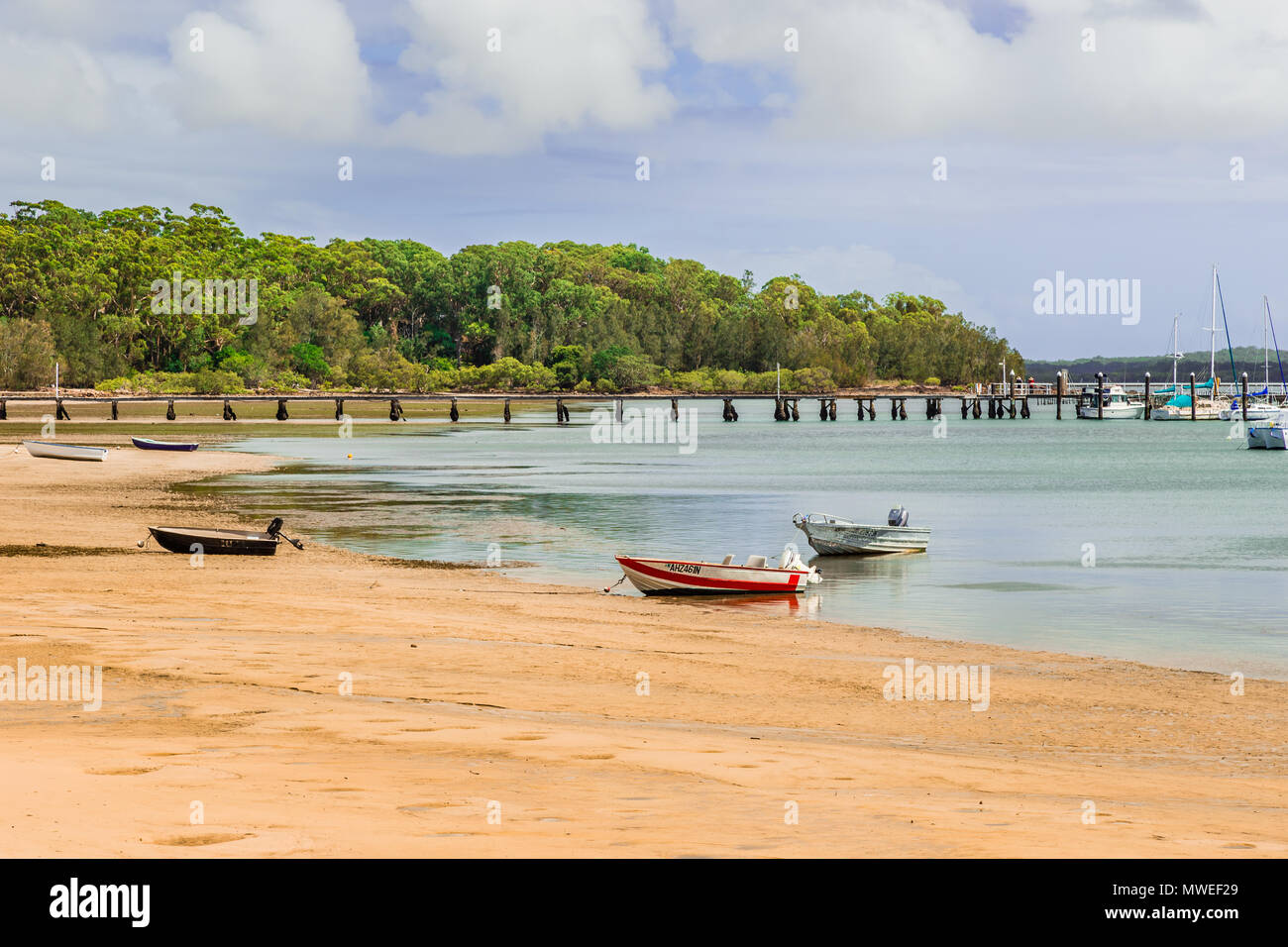 View of the harbour in Soldier's Point, NSW, Australia, with a walkway ...