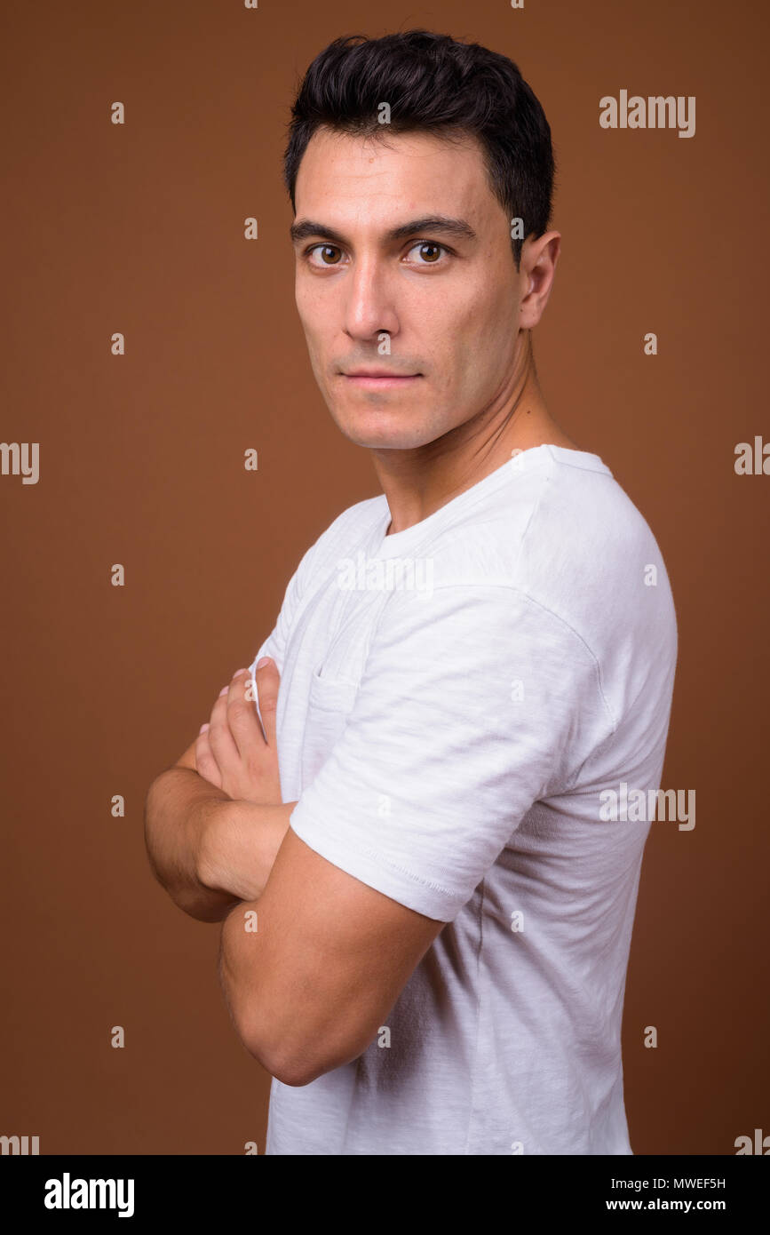 Hispanic young man white shirt hi-res stock photography and images - Alamy