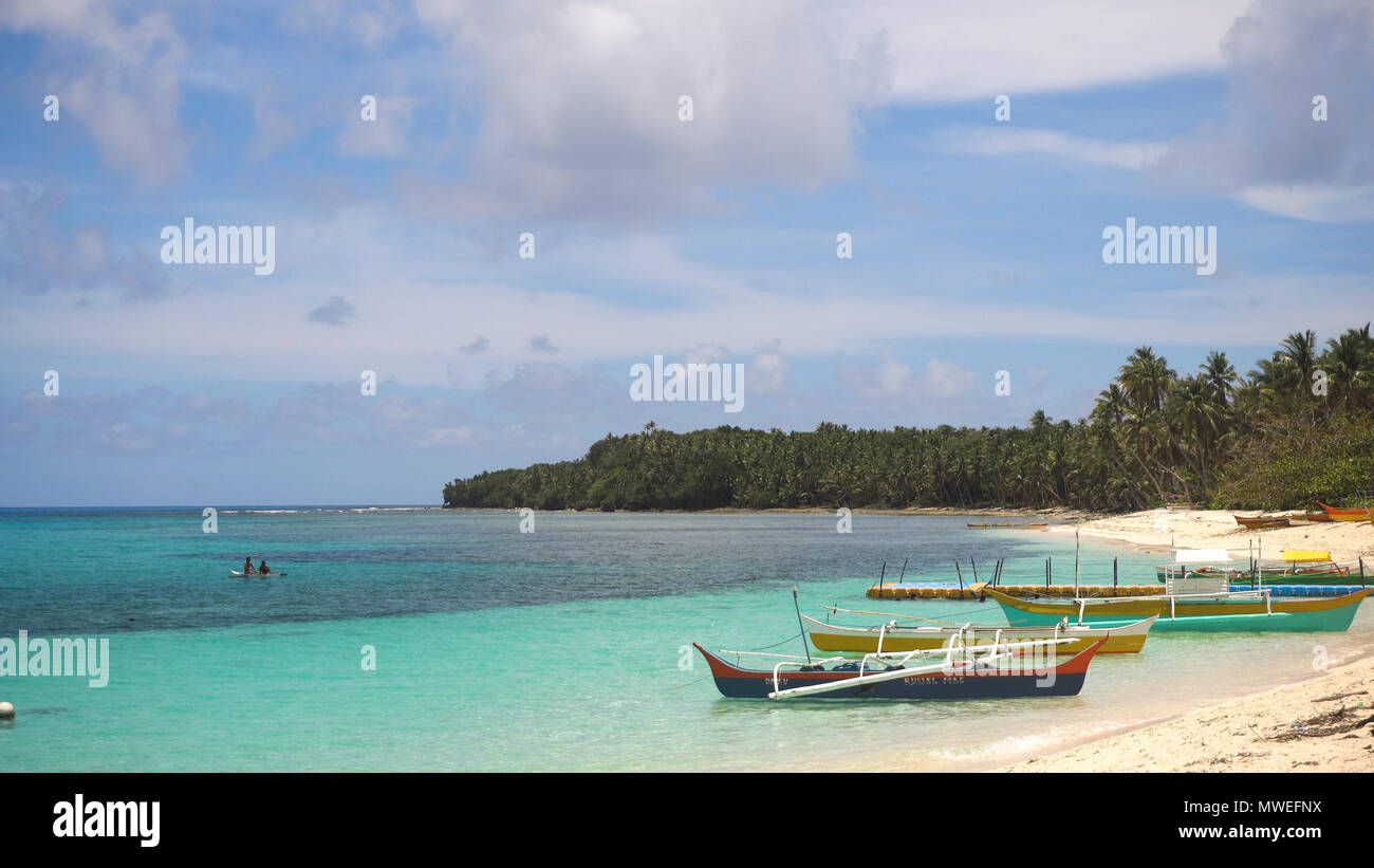Beach with white sand and palm trees on a tropical island. Seascape ...
