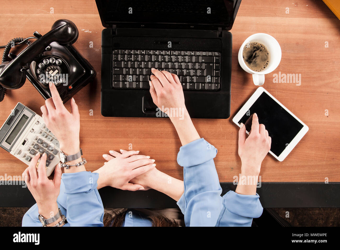 top view, business woman with a lot of hands works hard, multitasking ...