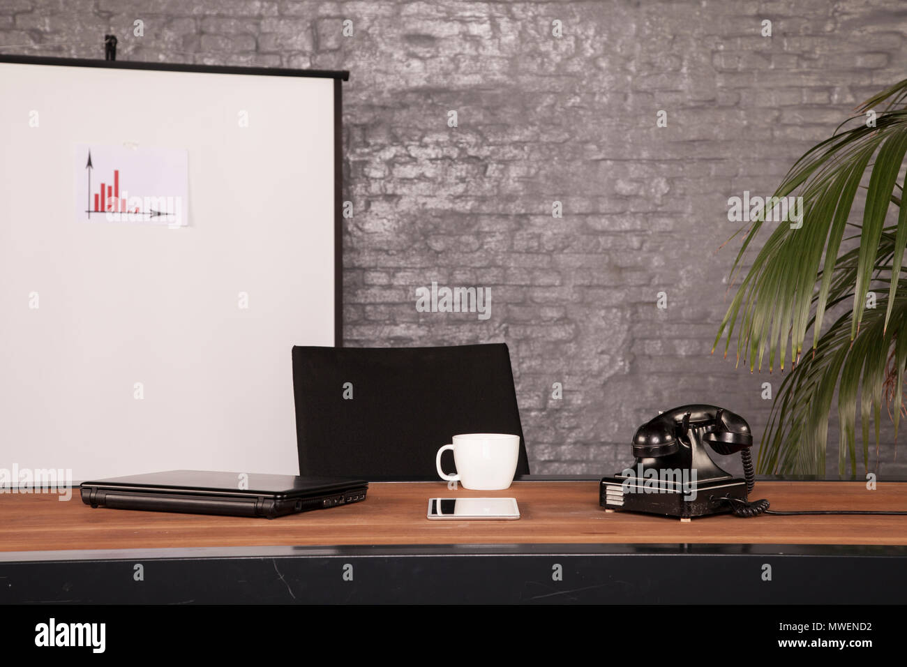 an empty desk in the office waiting for a new employee Stock Photo - Alamy
