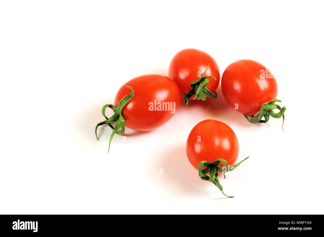 Group of traditional Italian tomatoes pachino isolated on white ...