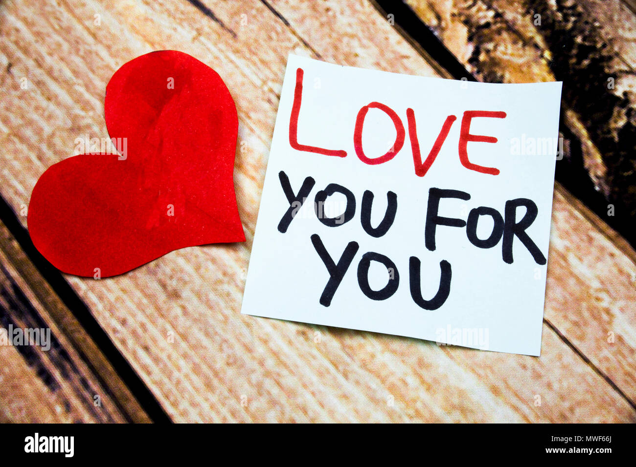 Emotional handwritten messages about love with red heart symbol above ...