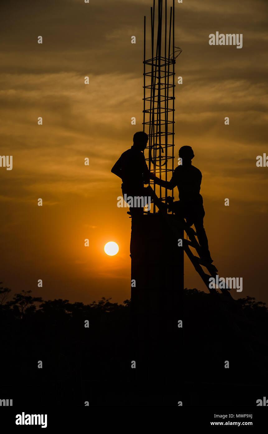 Working hardly hi-res stock photography and images - Alamy