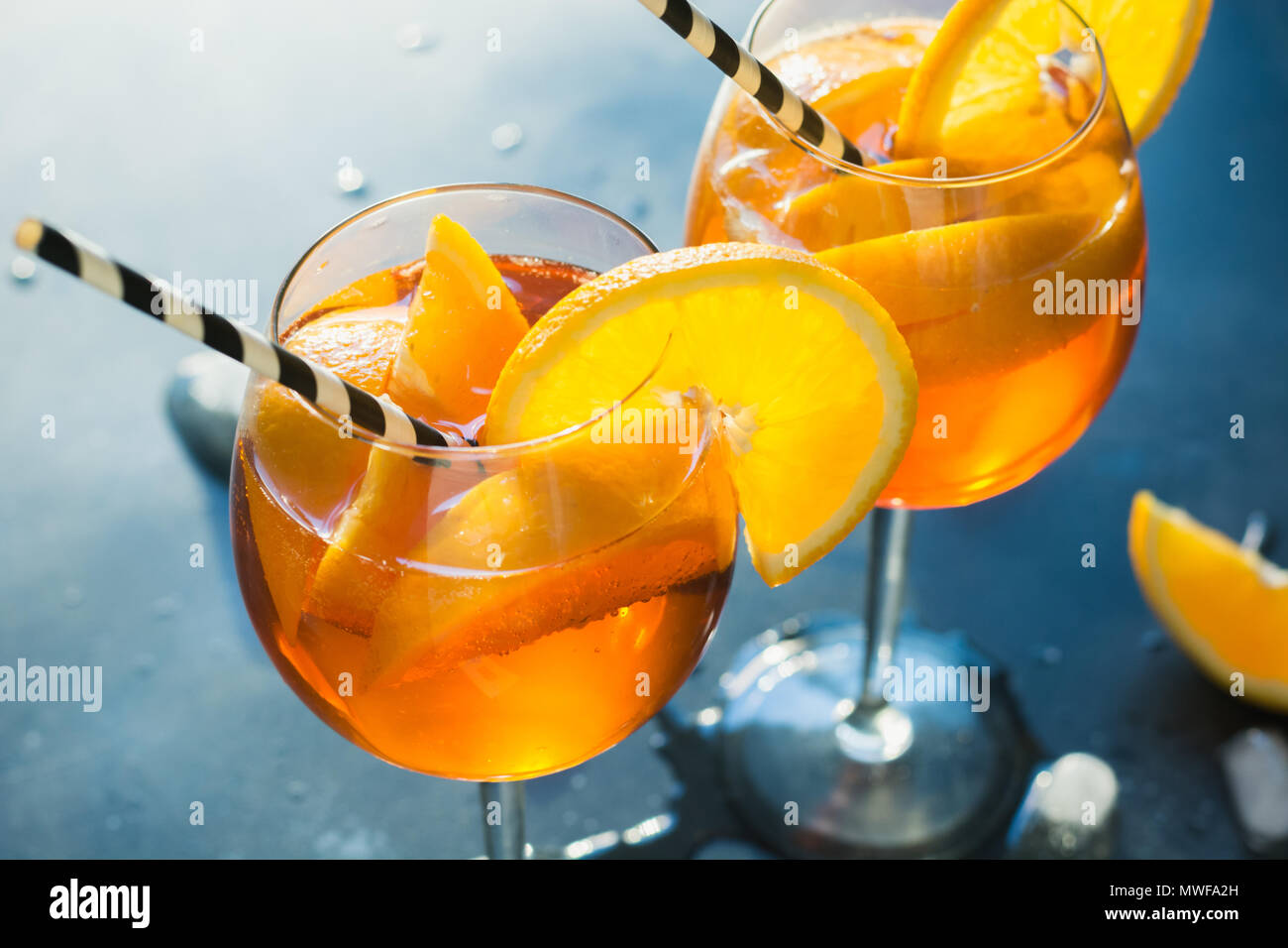 Classic italian aperol spritz cocktail in glass on dark. Close up Stock ...