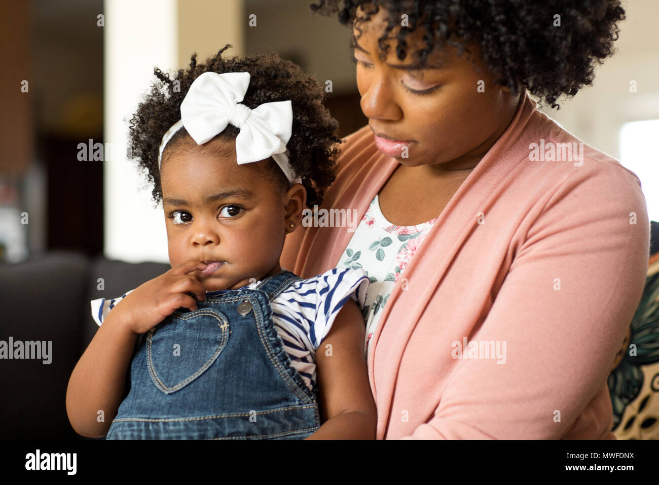 Mother parenting her young child Stock Photo - Alamy