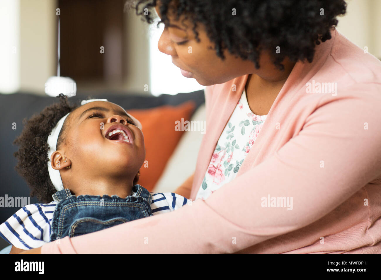 Mother parenting her young child Stock Photo - Alamy