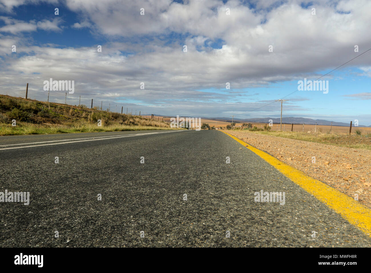 Receding road lane markings in the landscape, garden route, south ...