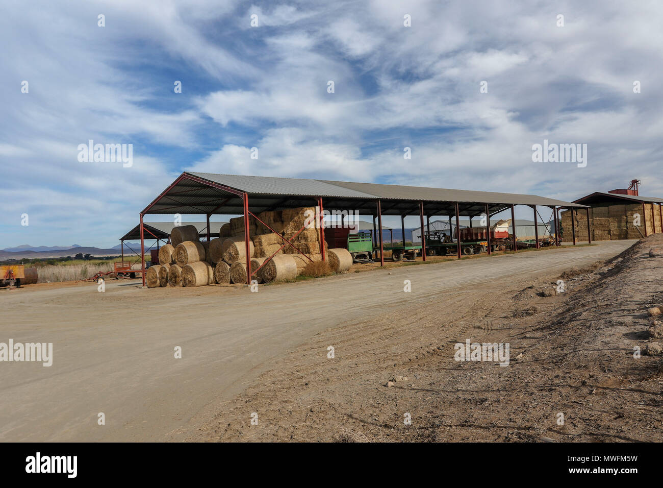 farm buildings with hay-bales near Oudtshoorn on the garden route ...