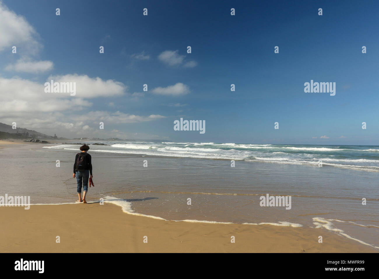 Holidaymaker on Wilderness beach, garden route, Wilderness, South ...