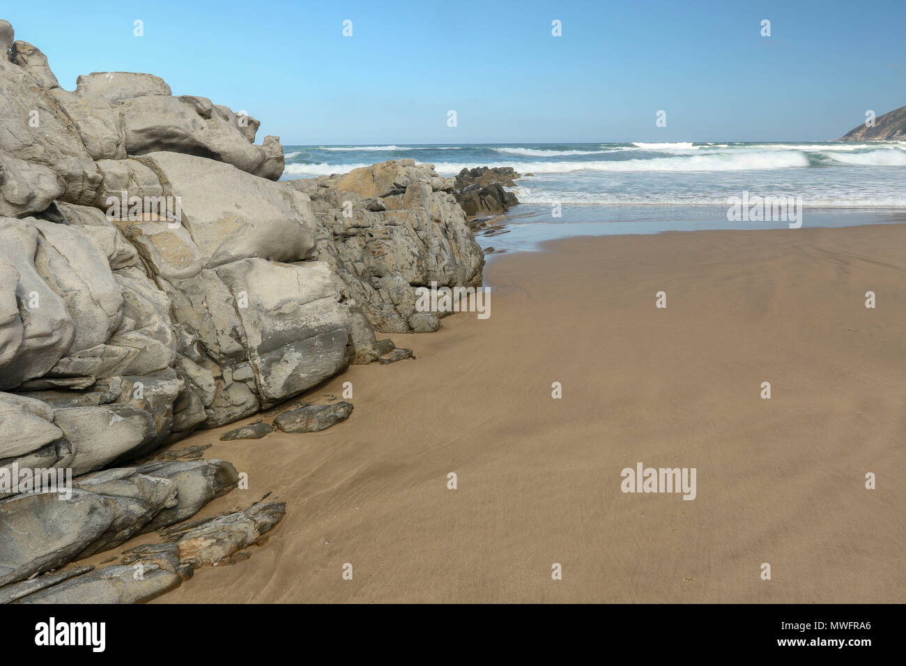 Rock outcrop and tide on Wilderness beach, wildernessss, garden route ...