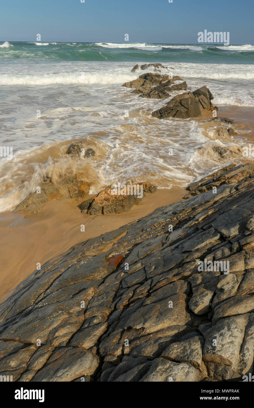 Rock outcrop and tide on Wilderness beach, wildernessss, garden route ...