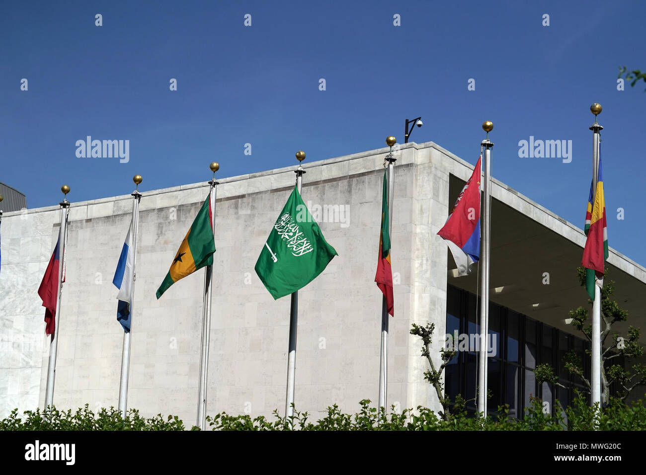 flags waving outside united nations building in manhattan new york ...