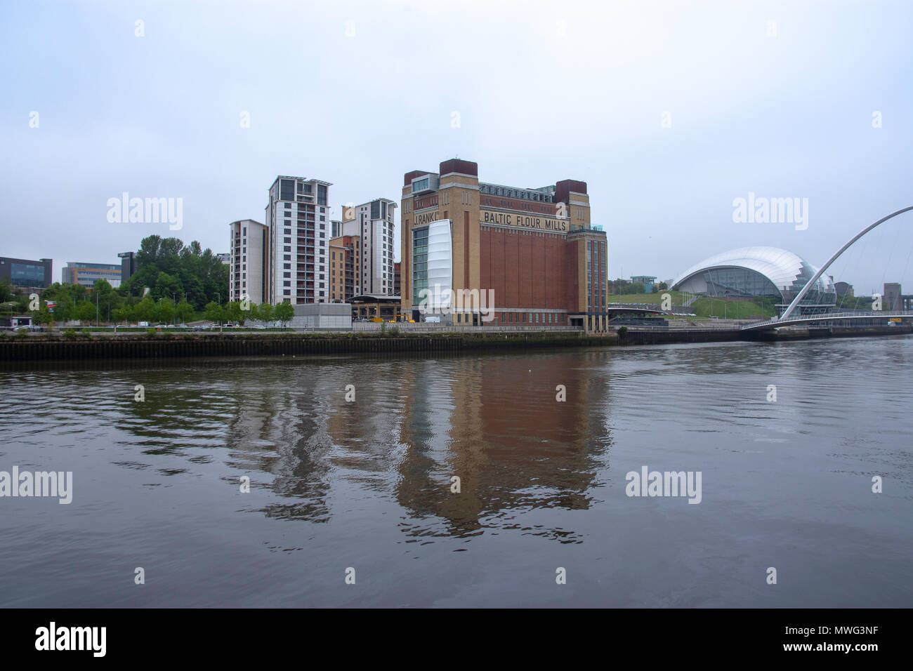 River Tyne, Newcastle upon Tyne Uk showing the Baltic Mills building in ...