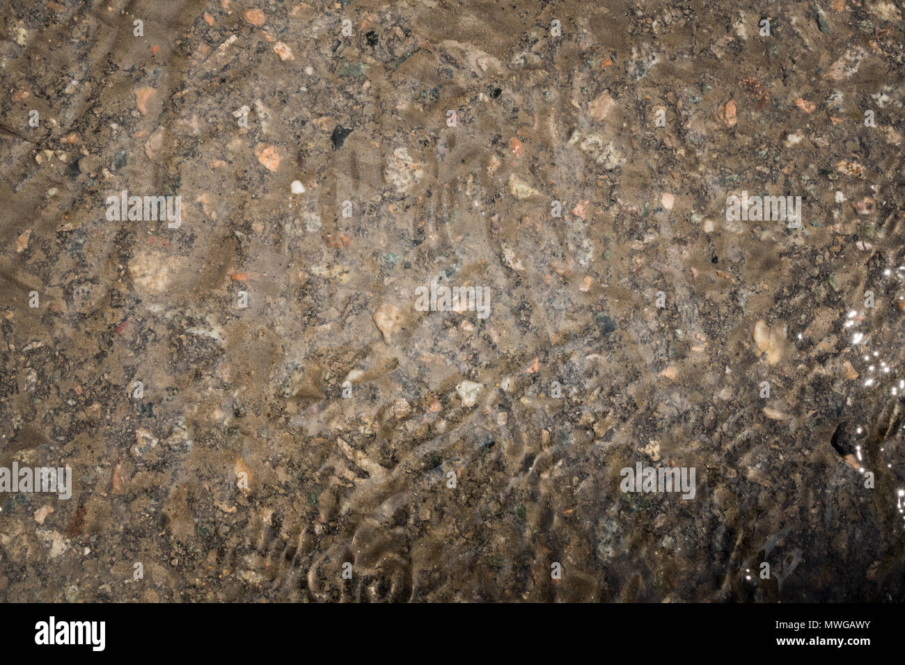 The texture of the bottom of the river is filled with stones ...