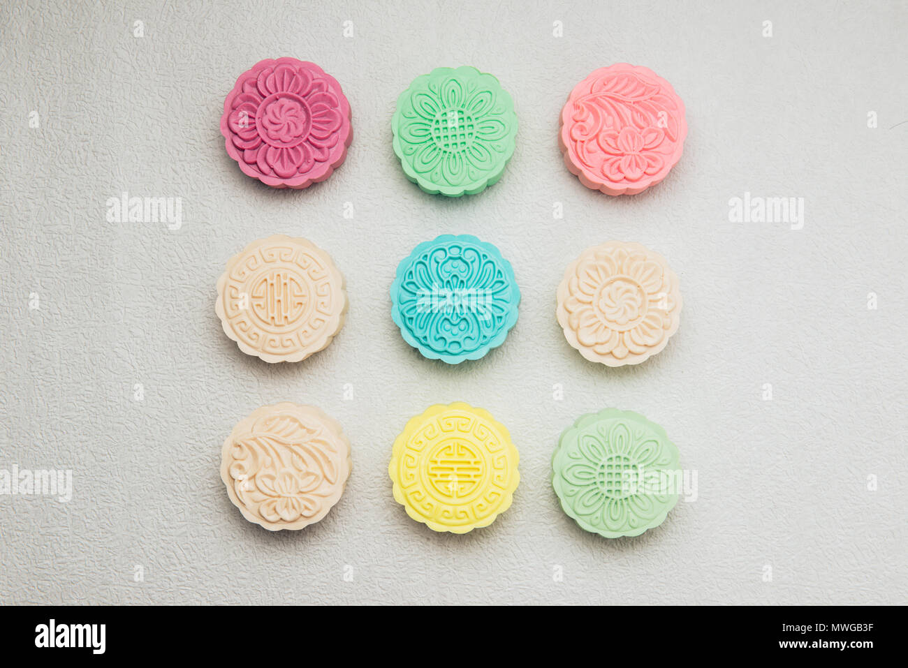 Sweet color of snow skin mooncake on plate. Chinese mid autumn festival ...
