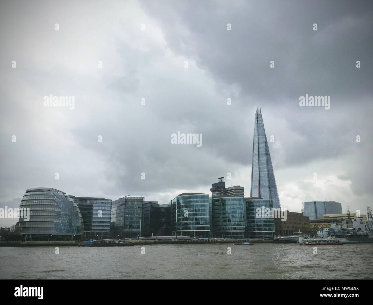 A view of the shard and city hall at sunset hi-res stock photography ...