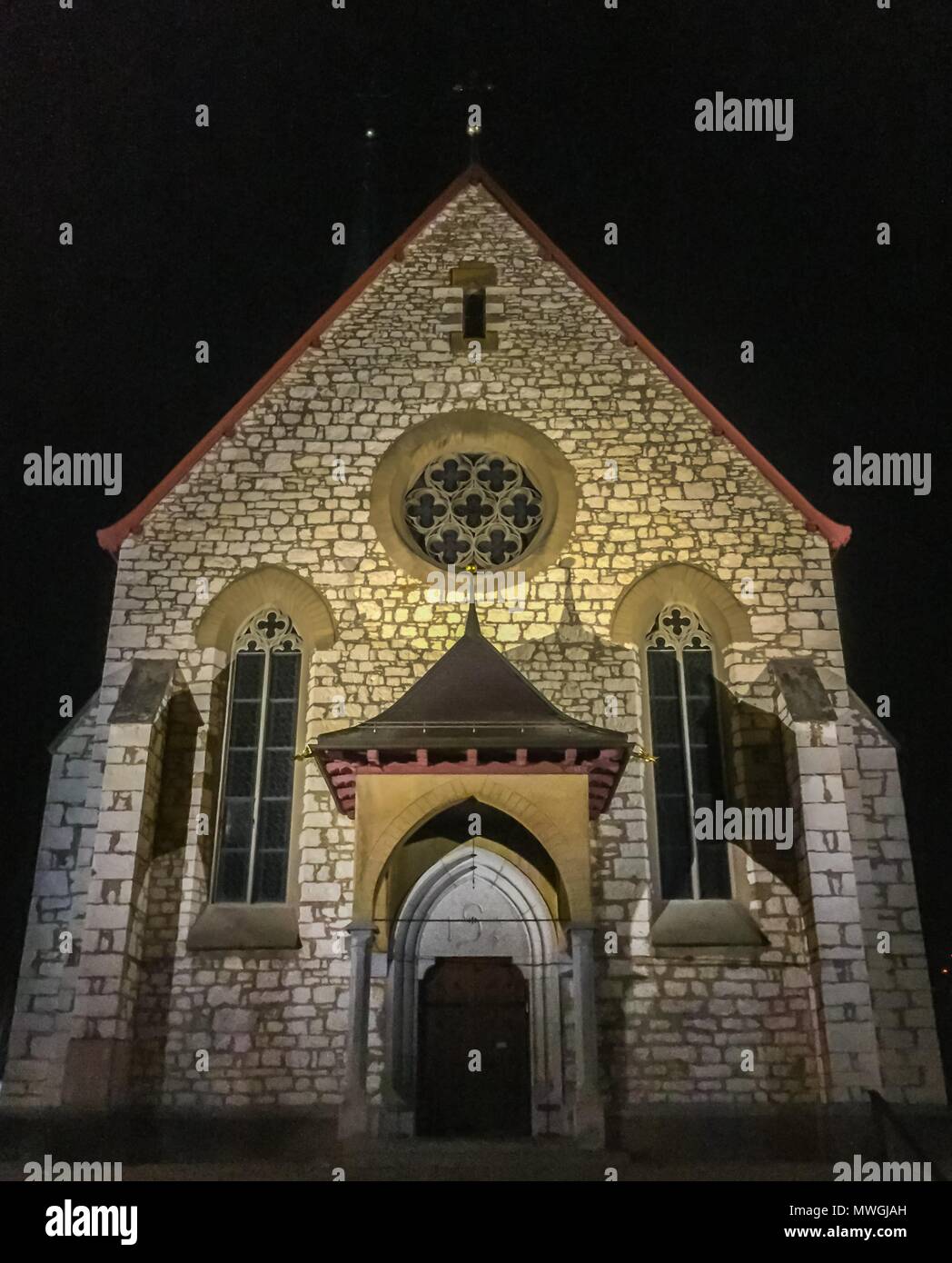 Photography of churc in Swiotzerland by night Stock Photo - Alamy