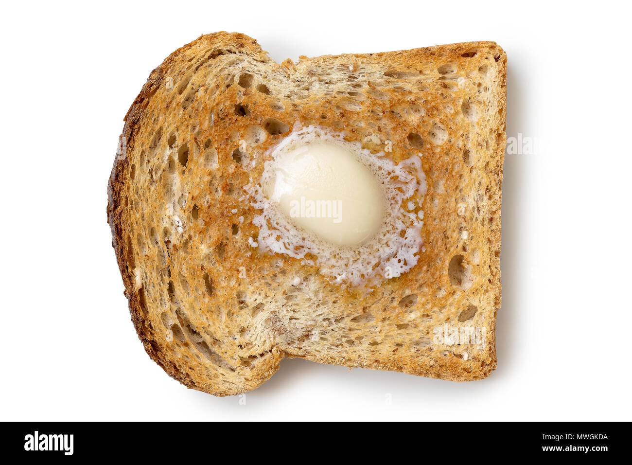 A single slice of whole wheat toast with a knob of melting butter ...