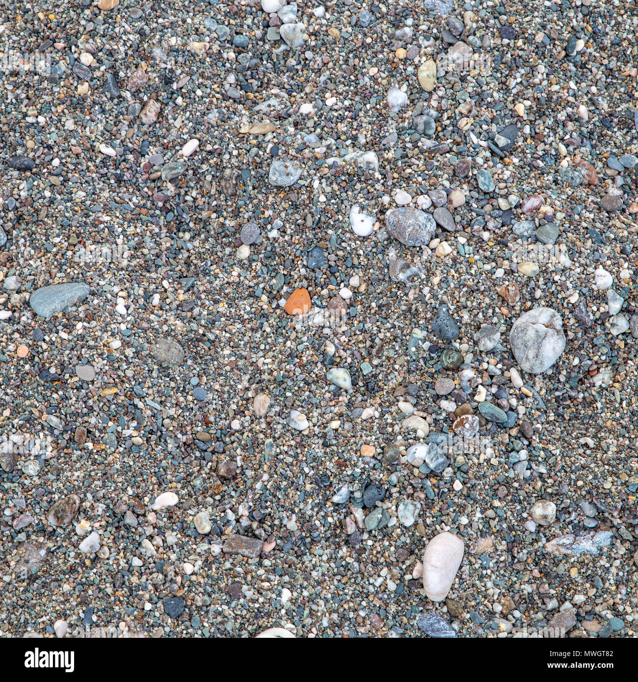 Pebbles on the sea shore. Pebble background Stock Photo - Alamy