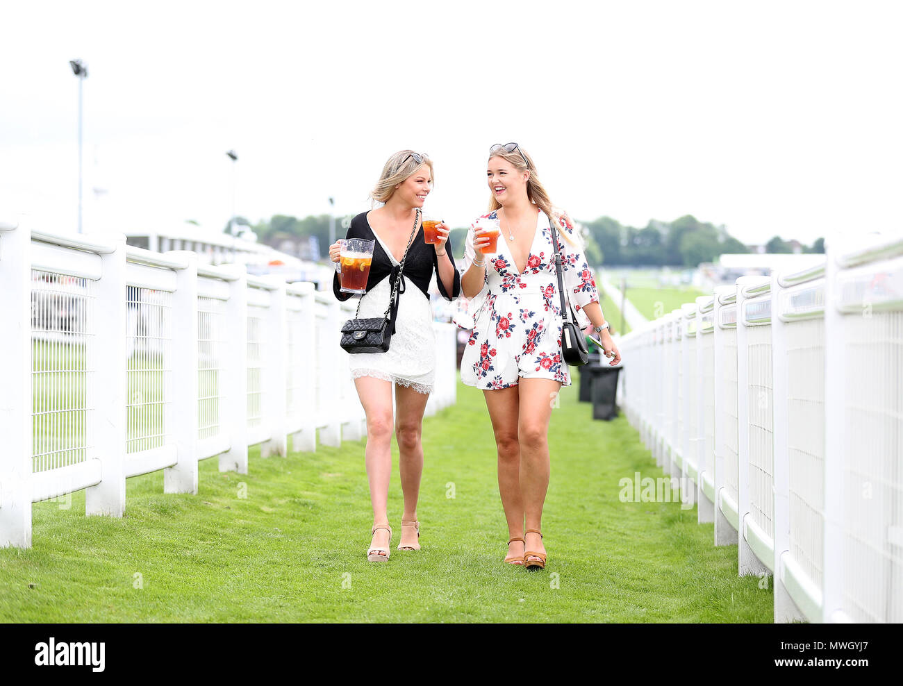 Female racegoers ladies day epsom downs racecourse hi-res stock ...