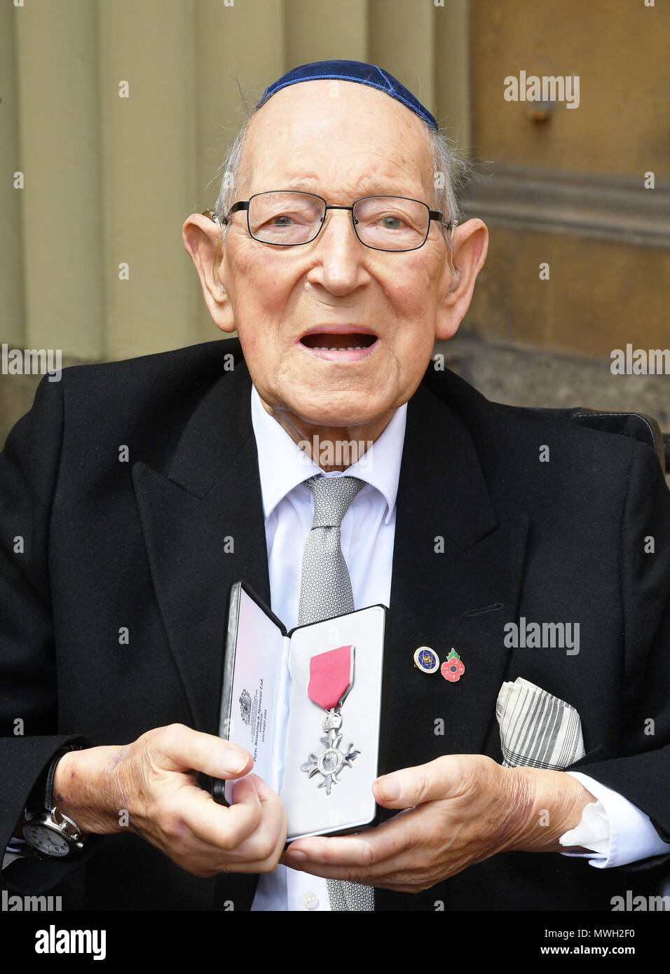 Lieutenant Colonel Mordaunt Cohen, 101, holds his MBE (Member of the ...
