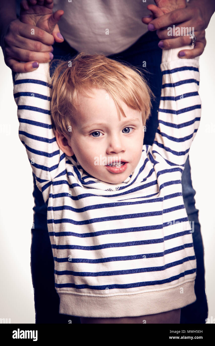 Young Caucasian Toddler Boy Acts Silly On A Photo Shoot In Front of A ...
