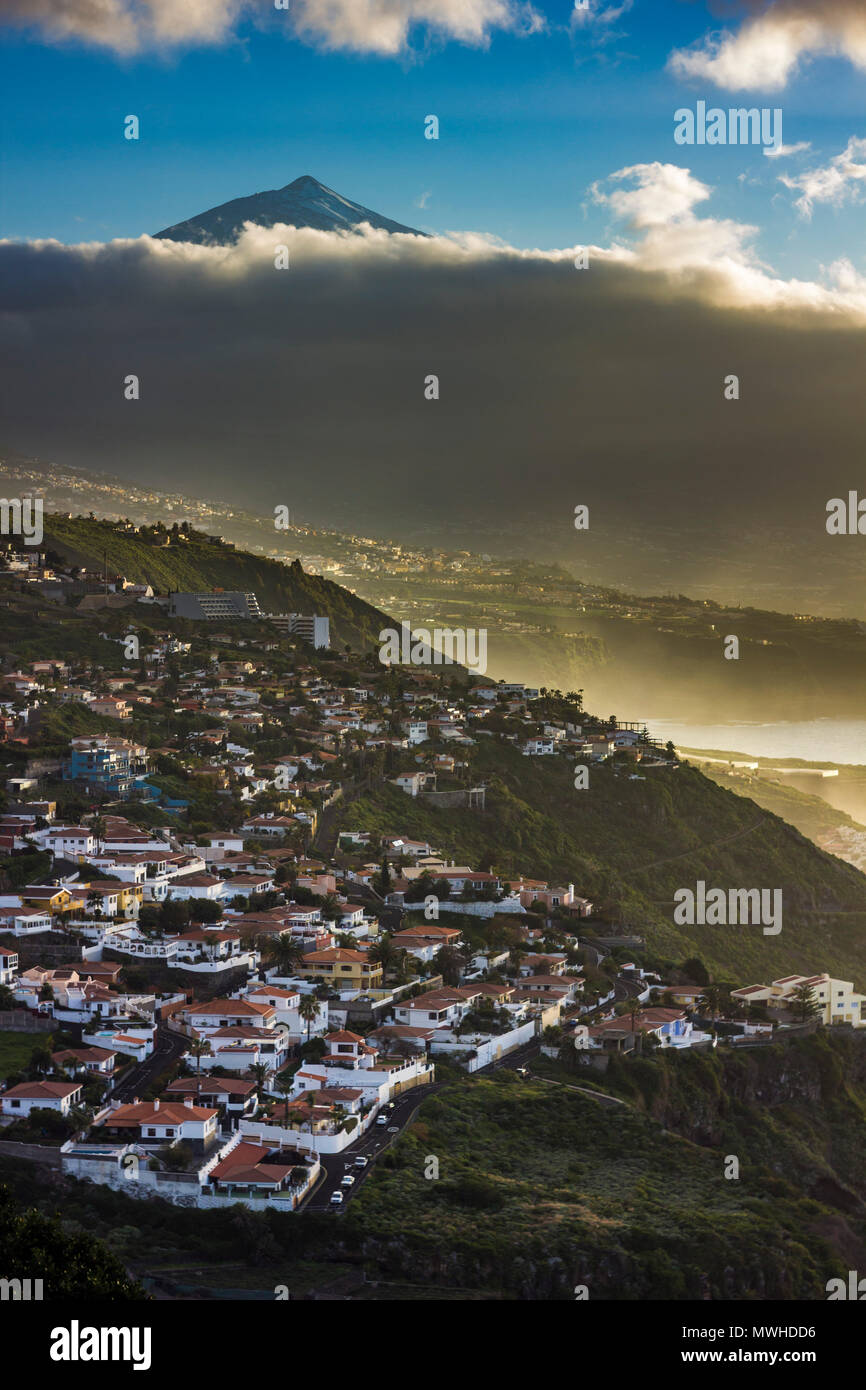 colorful sunset on canarian island tenerife with view on teide volcano ...
