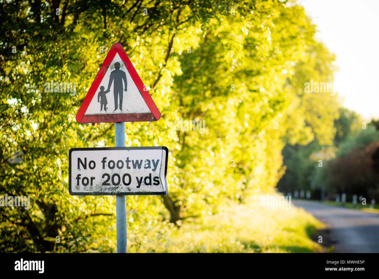 A sign warning drivers and pedestrians that there is no footway for 200 ...