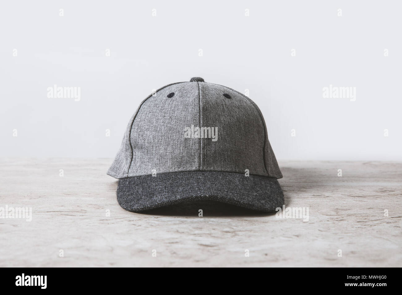 Grey cap hi-res stock photography and images - Alamy